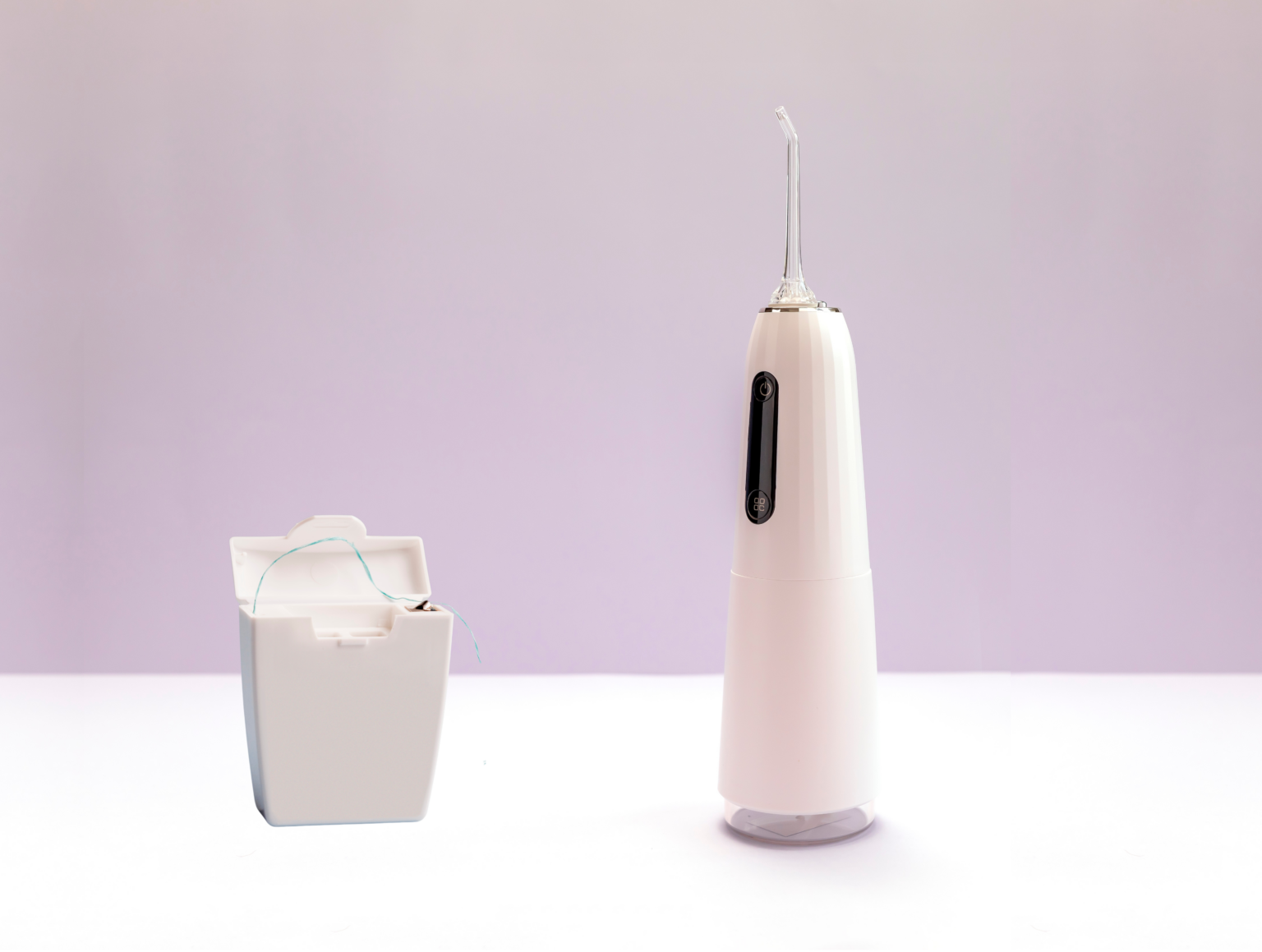 Water Flossing vs. String Flossing | Hamilton Dental